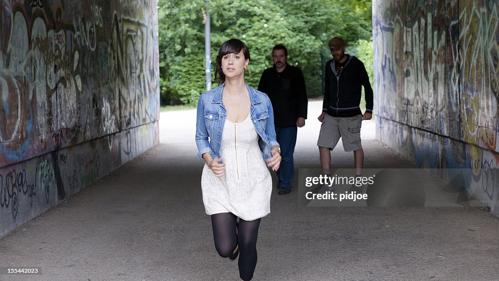Scared Woman Running In Spooky Tunnel High-Res Stock Photo - Getty Images Scared Woman Running In Spooky Tunnel High-Res Stock Photo - Getty Images