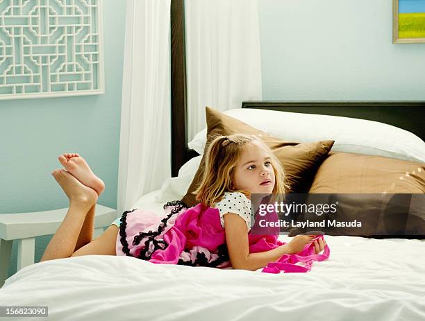 Laying On Stomach Feet Up Photos And Premium High Res Pictures Getty