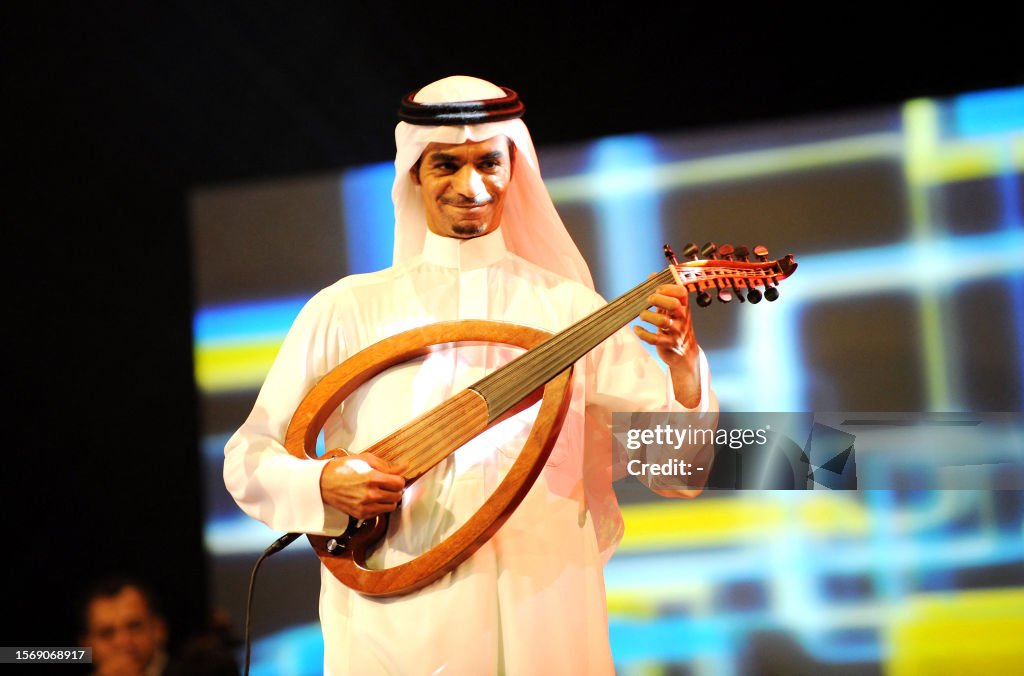 Saudi Singer Rabeh Saqer Plays The Electronic Oud During A Concert In
