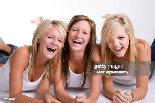 Friends Laughing Hysterically Photos And Premium High Res Pictures
