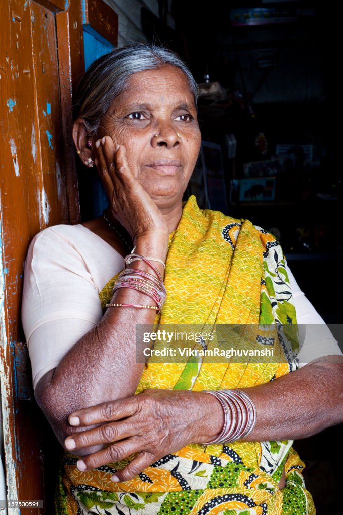 Pensive Senior Indian Woman Vertical Portrait High-Res Stock Photo ... Pensive Senior Indian Woman Vertical Portrait High-Res Stock Photo ...