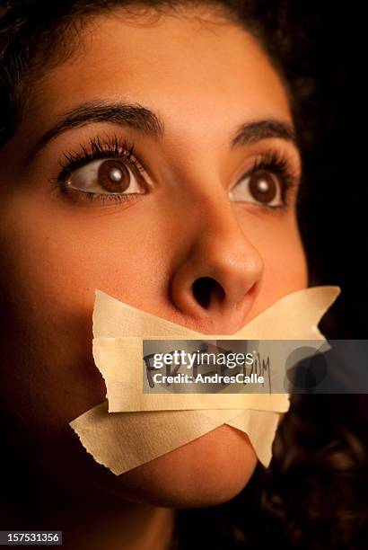Tape Over Mouth Woman Fotografías E Imágenes De Stock Getty Images