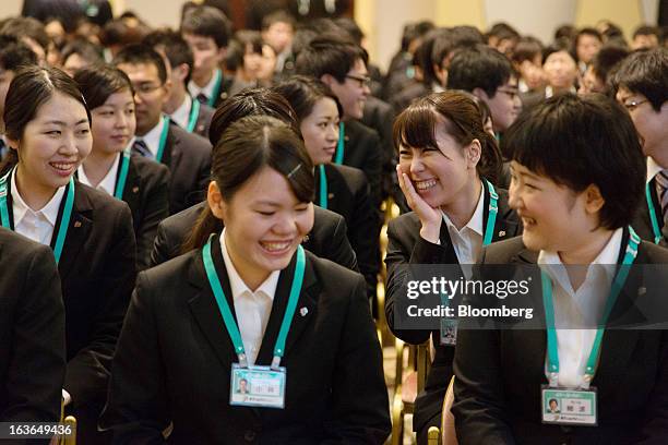 48 Seven I Holdings Co New Employees Attend Initiation Ceremony Stock