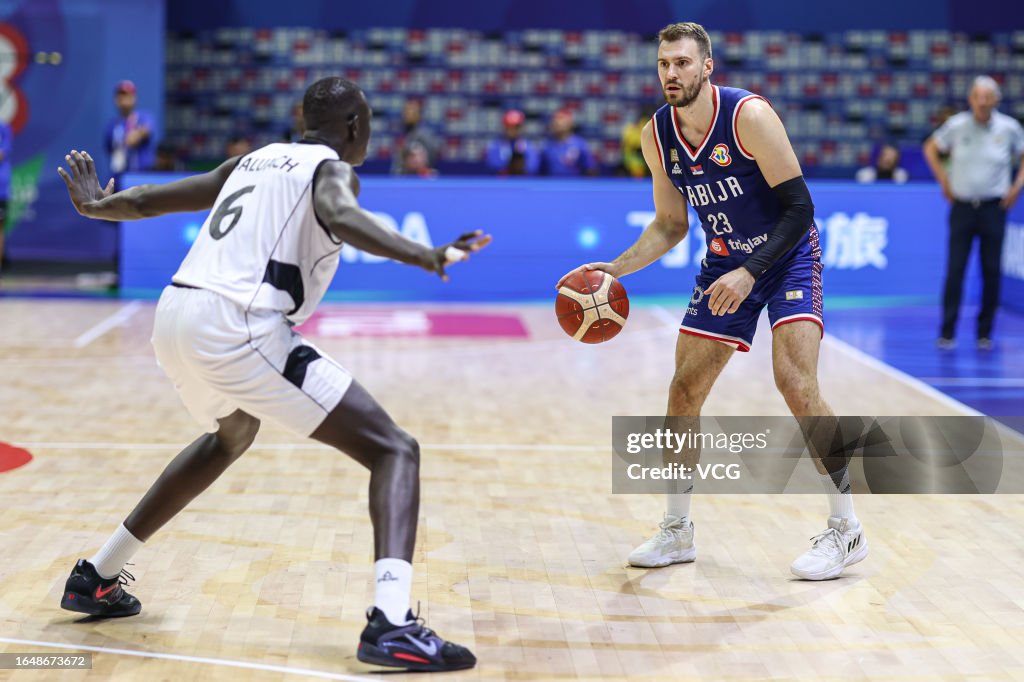 Marko Guduric Of Serbia Drives The Ball During The First Round Group