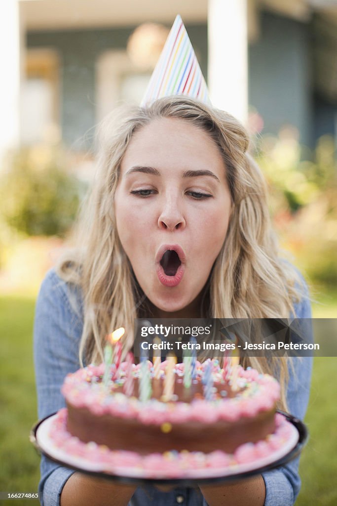 Usa Utah Provo Portrait Of Young Woman Blowing Birthday Candles High