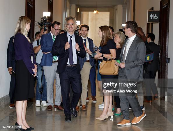 Alex Karp, CEO of Palantir, talks to reporters as he leaves the “AI ... Alex Karp, CEO of Palantir, talks to reporters as he leaves the “AI ...
