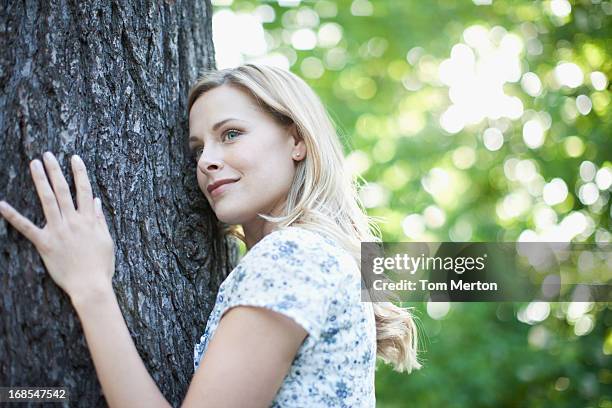 Tree Hugging Woman Photos And Premium High Res Pictures Getty Images
