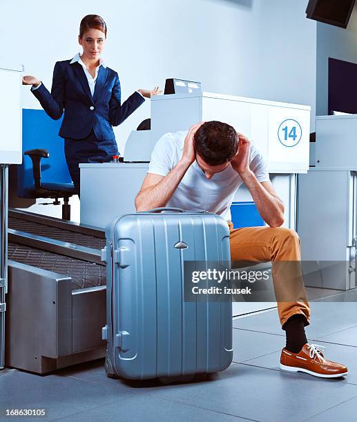 Frustrated Airline Passenger Photos And Premium High Res Pictures