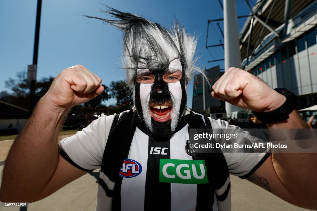 Collingwood Fan Pose For A Photo During The 2023 Afl Grand Final