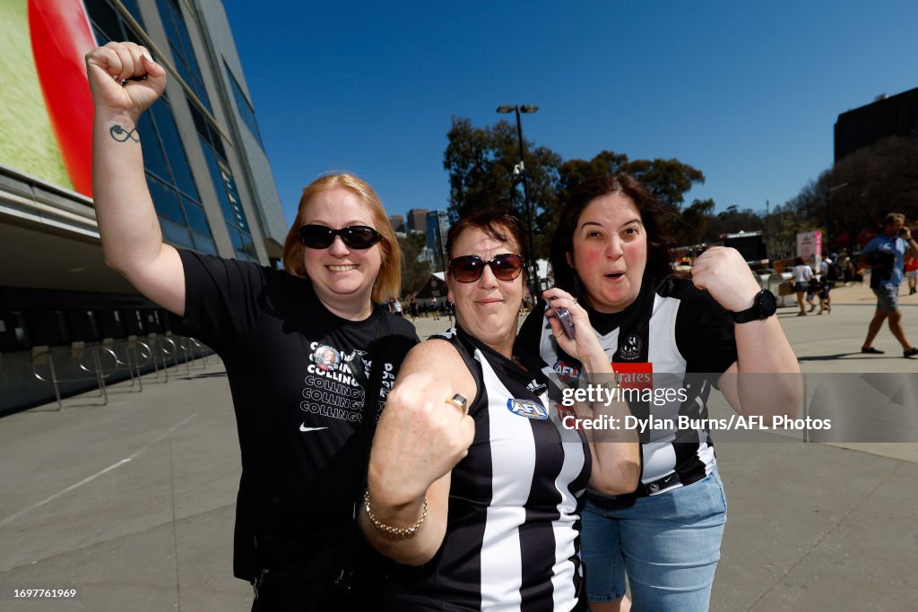 Collingwood Fans Pose For A Photo During The 2023 Afl Grand Final