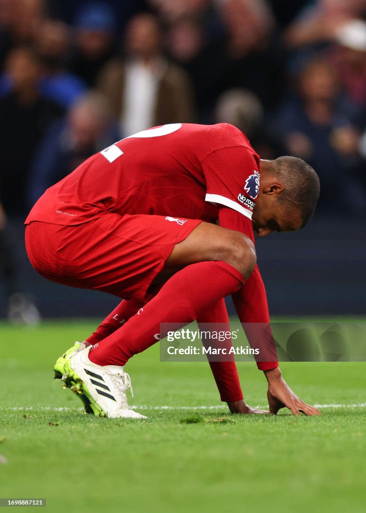 Joel Matip Of Liverpool Reacts After Scoring An Own Goal During The