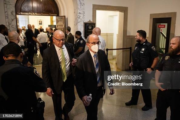 Donald Bender, former accountant at Mazars USA, center, departs from ... Donald Bender, former accountant at Mazars USA, center, departs from ...