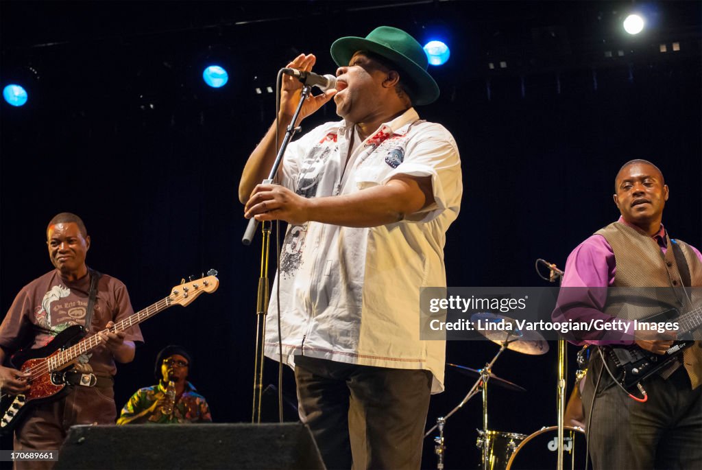 Congolese soukous musician Kanda Bongo Man performs with his band at ... Congolese soukous musician Kanda Bongo Man performs with his band at ...