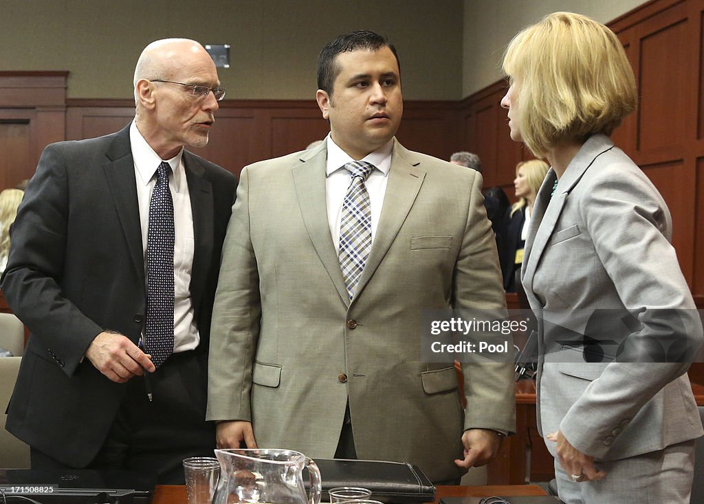 Don West And Lorna Truett Talk With Their Client George Zimmerman