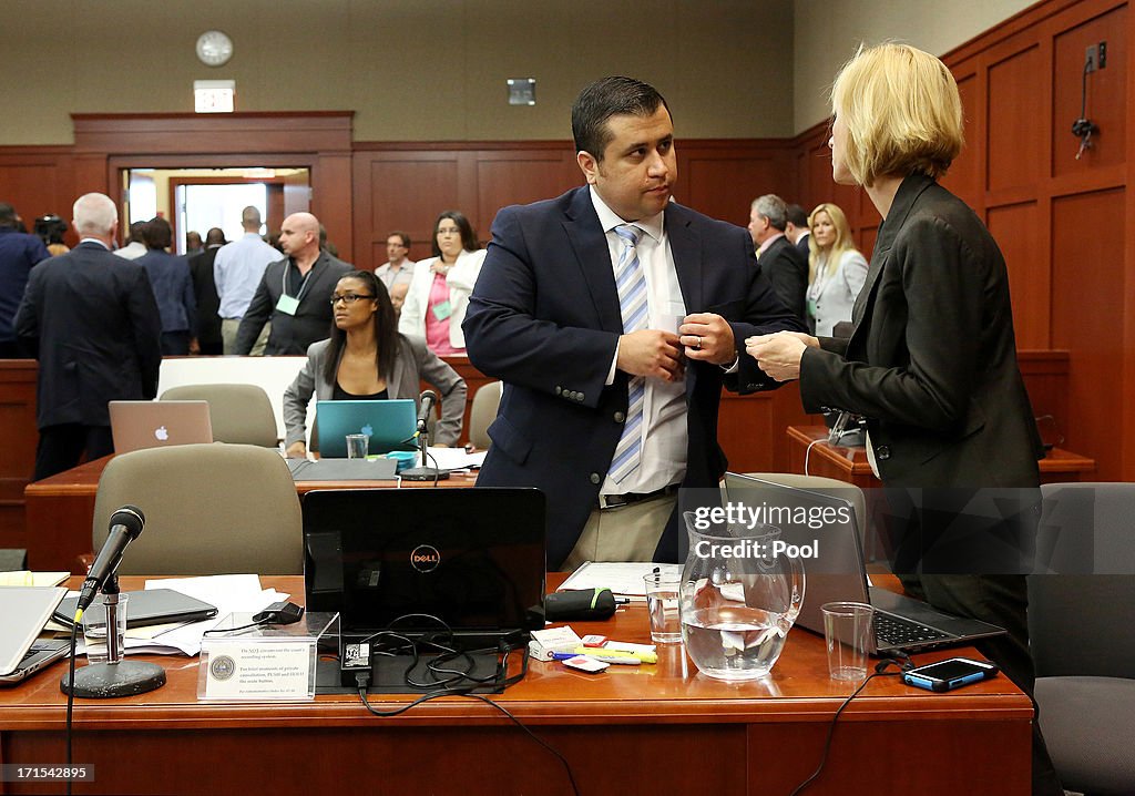 George Zimmerman Speaks With Attorney Lorna Truett During Day 13 Of