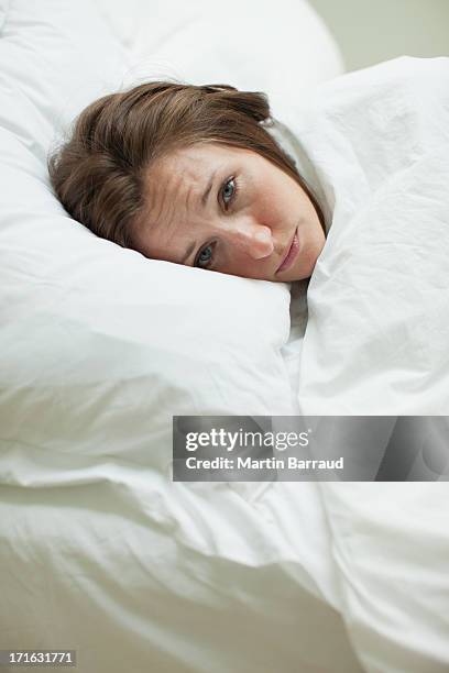 Sick Woman Laying In Bed Under Blanket High-Res Stock Photo - Getty Images Sick Woman Laying In Bed Under Blanket High-Res Stock Photo - Getty Images