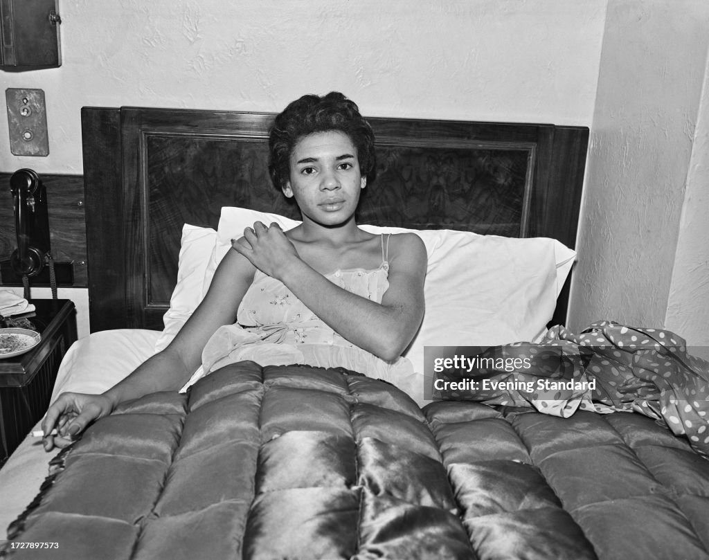 British Singer Shirley Bassey Smoking A Cigarette In Her Bed At The News Photo Getty Images