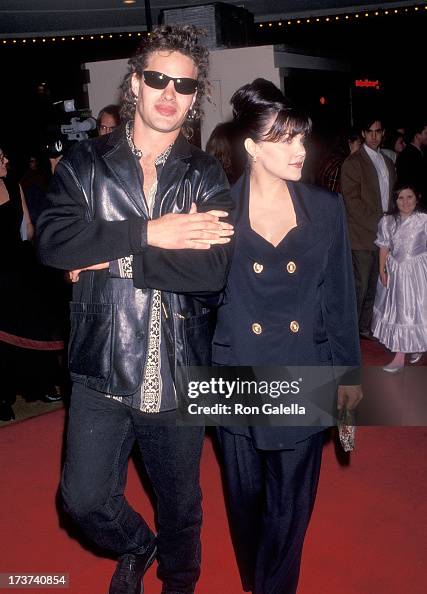 Actress Sherilyn Fenn and boyfriend Toulouse Holliday attend the ... Actress Sherilyn Fenn and boyfriend Toulouse Holliday attend the ...