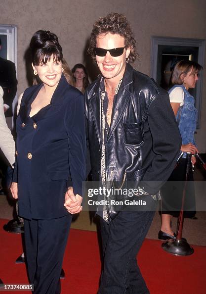 Actress Sherilyn Fenn and boyfriend Toulouse Holliday attend the ... Actress Sherilyn Fenn and boyfriend Toulouse Holliday attend the ...