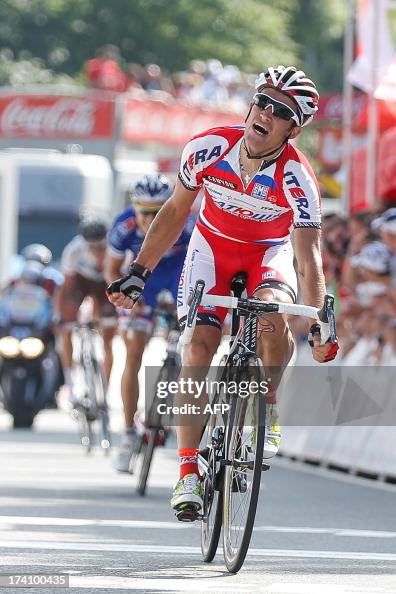 Team Katusha Russian cyclist Alexander Kolobnev celebrates as he ... Team Katusha Russian cyclist Alexander Kolobnev celebrates as he ...
