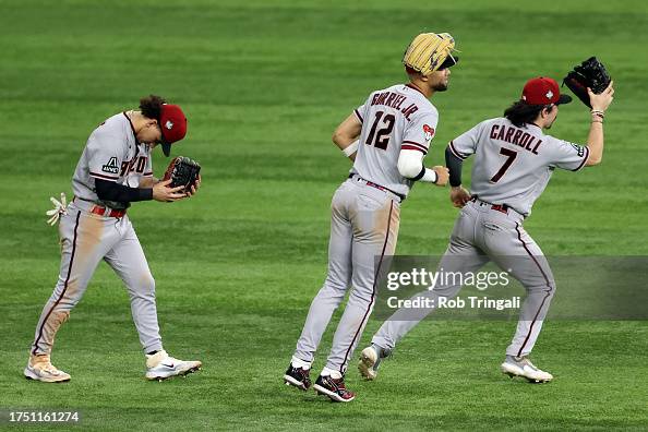 Alek Thomas, Corbin Carroll and Lourdes Gurriel Jr. #12 of the ... Alek Thomas, Corbin Carroll and Lourdes Gurriel Jr. #12 of the ...