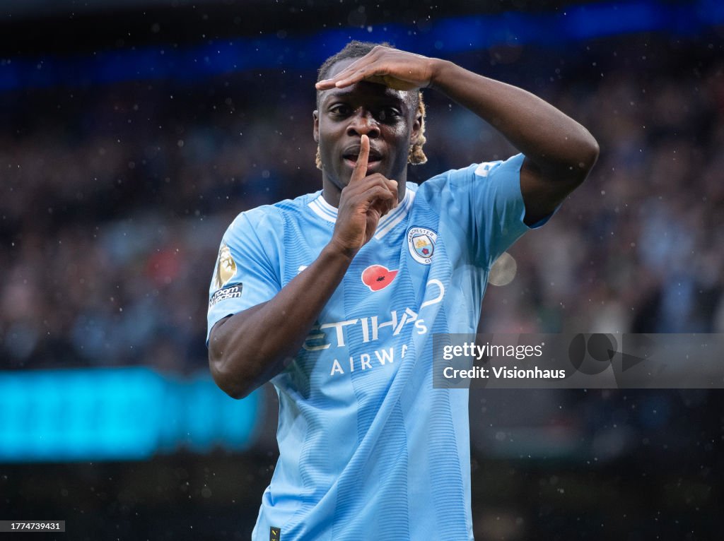 Jeremy Doku Of Manchester City Celebrates Scoring His Goal During The