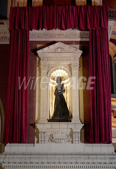 Statue Of Britains Queen Elizabeth Ii Is Lit Up After The Unveiling By