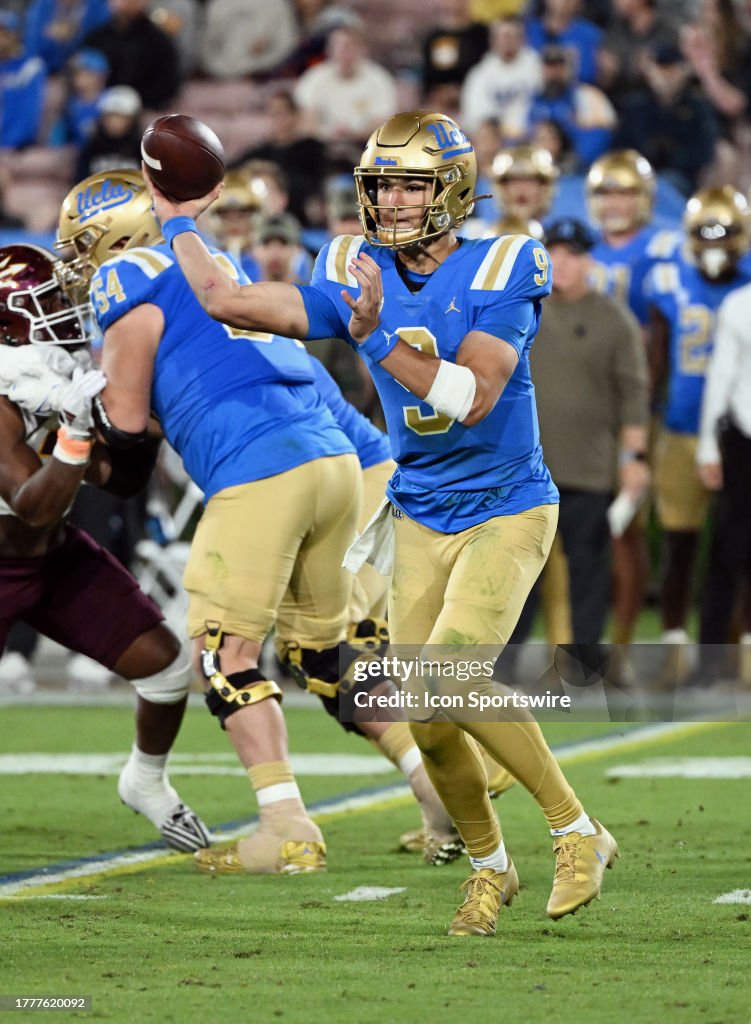 Bruins quarterback Collin Schlee throws a pass on the run during an ... Bruins quarterback Collin Schlee throws a pass on the run during an ...