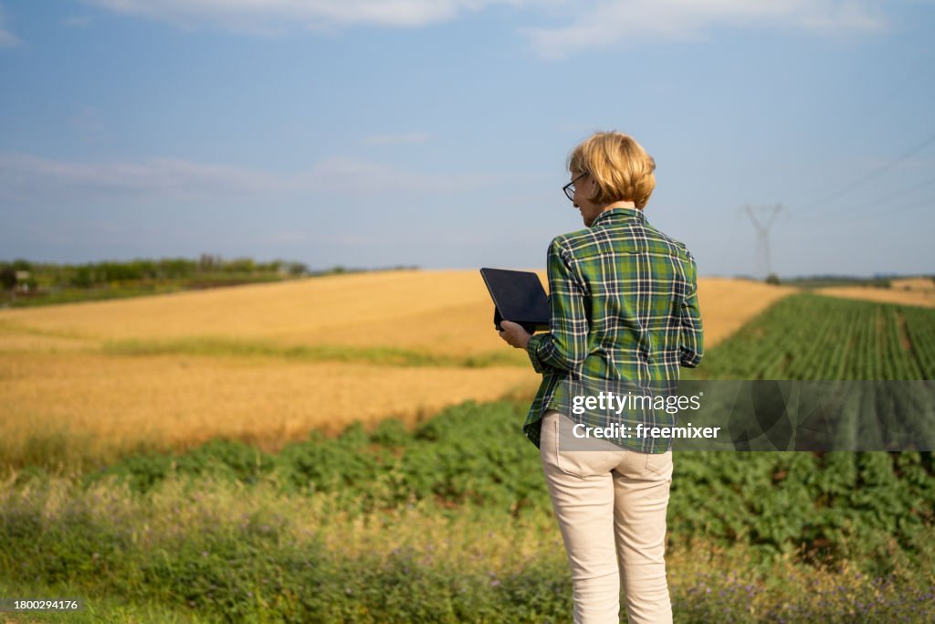 Farmer Woman Using Modern Technology High-Res Stock Photo - Getty Images Farmer Woman Using Modern Technology High-Res Stock Photo - Getty Images