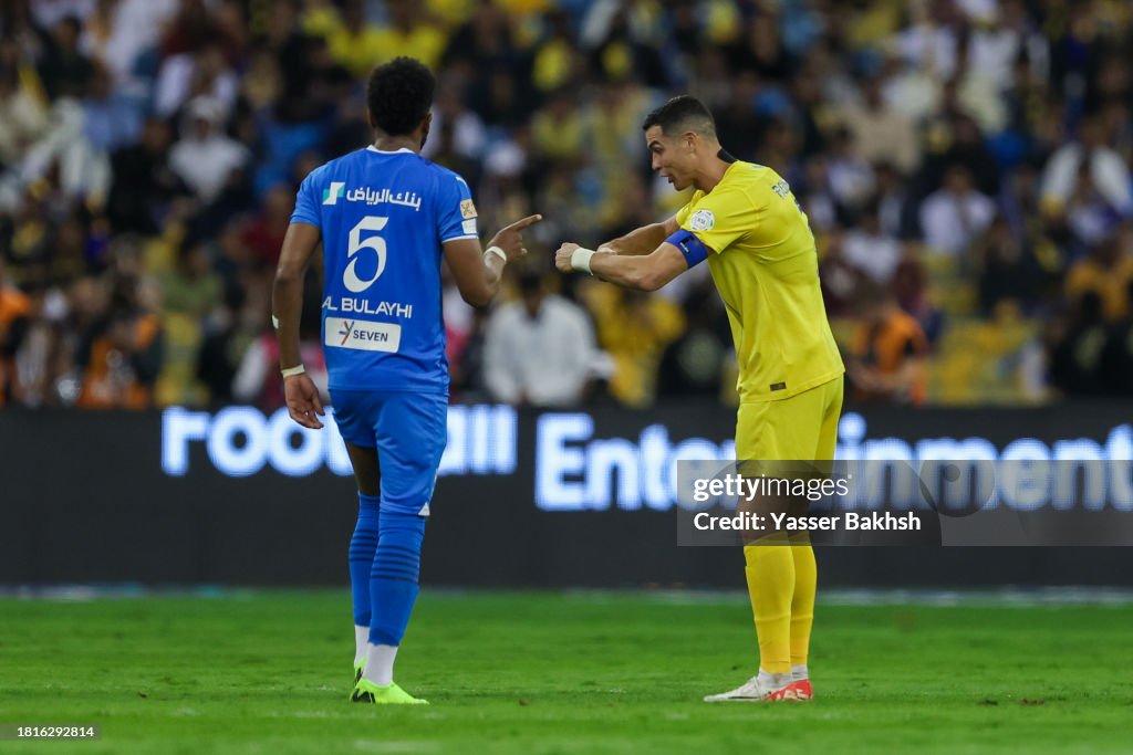Ali Al Buliahi Of Al Hilal And Cristiano Ronaldo Of Al Nassr Fight