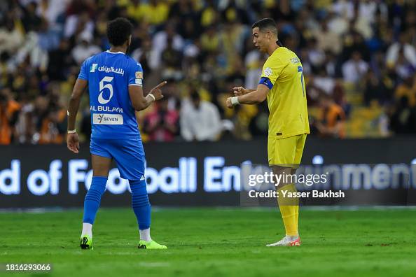 Ali Al Buliahi Of Al Hilal And Cristiano Ronaldo Of Al Nassr Fight