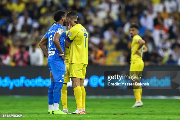 Ali Al Buliahi Of Al Hilal And Cristiano Ronaldo Of Al Nassr Fight