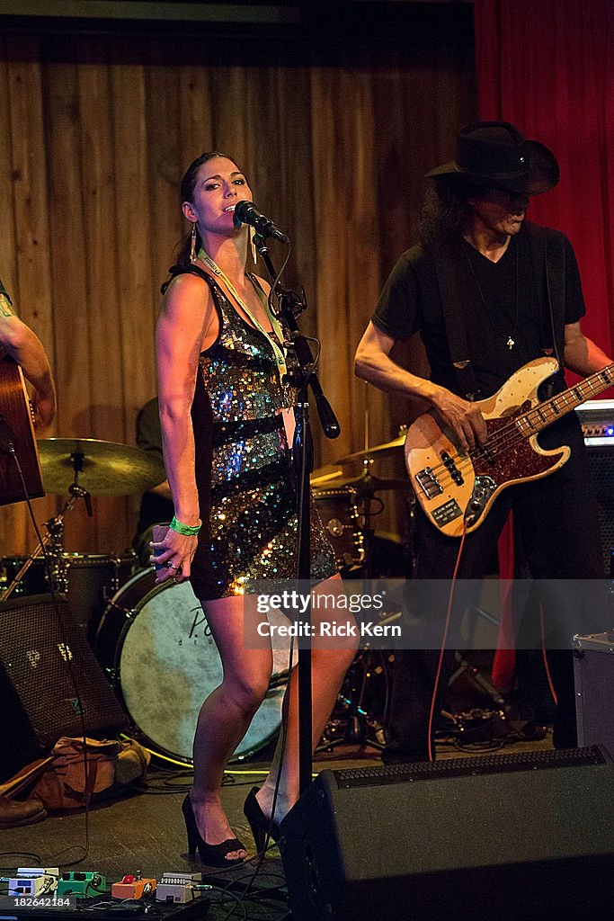Actress Emmy Robbin Sings On Stage During The Machete Kills News Photo Getty Images