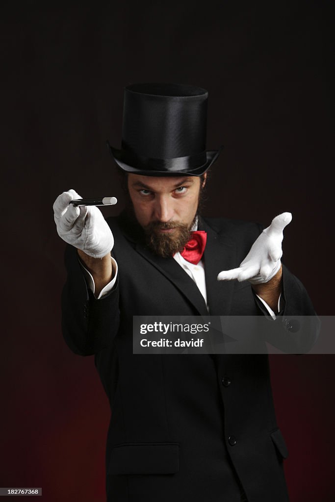 Magician Performing Tricks High-Res Stock Photo - Getty Images Magician Performing Tricks High-Res Stock Photo - Getty Images