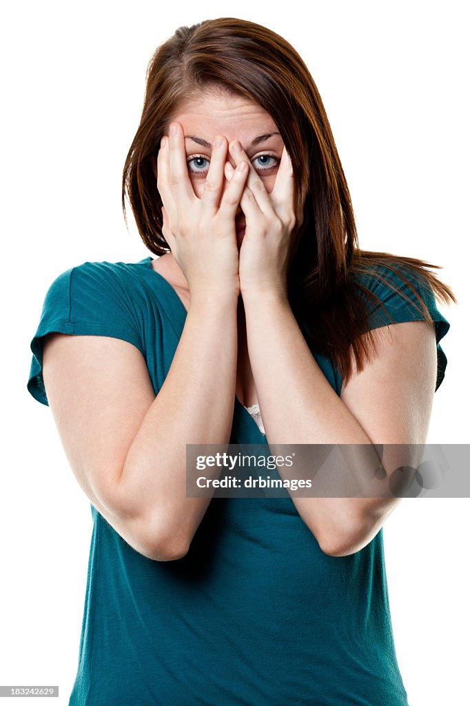 A Stressed Young Woman Covering Her Face With Her Hands High Res Stock