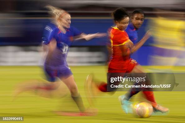 Jenna Nighswonger And Naomi Girma Of The United States Defend During