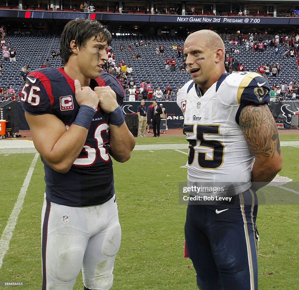 Brian Cushing of the Houston Texans talks with James Laurinaitis of ... Brian Cushing of the Houston Texans talks with James Laurinaitis of ...