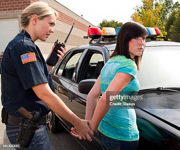 Woman Arrested Cuffed