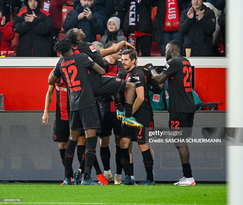 Bayer Leverkusens Dutch Defender Jeremie Frimpong Celebrates With