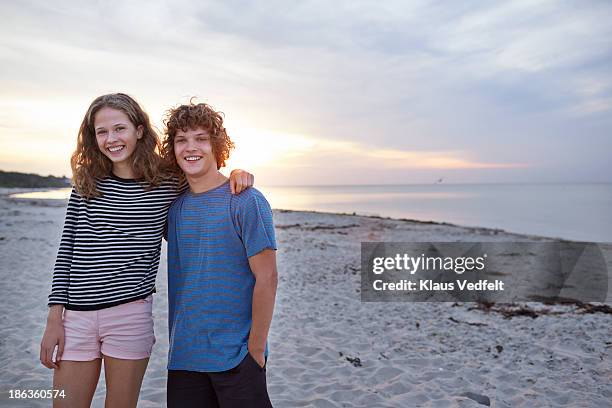 Two Girls Touching Each Other Photos And Premium High Res Pictures