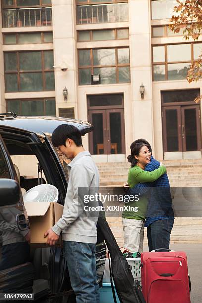Asian Mother And Son College Photos And Premium High Res Pictures