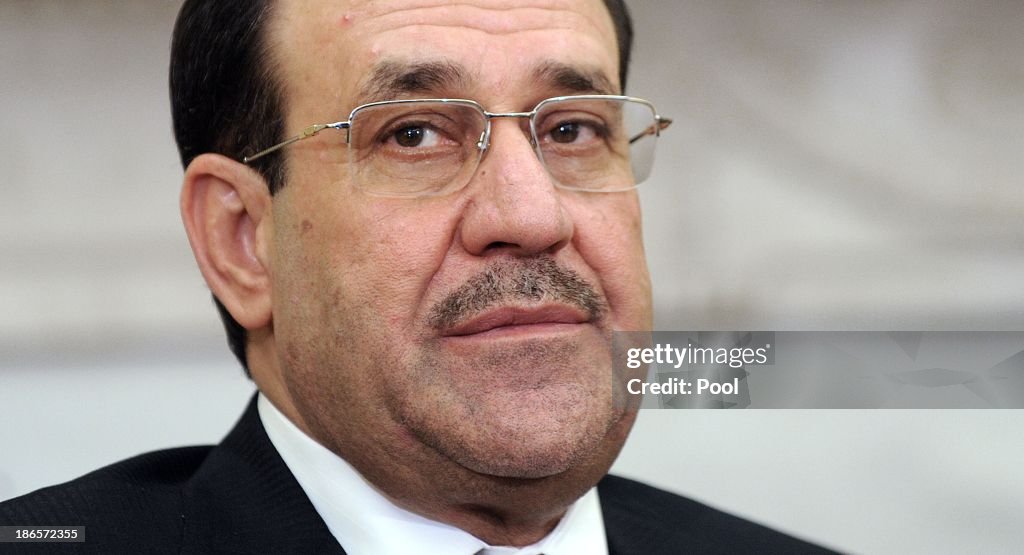 Iraqi Prime Minister Nouri Al Maliki Speaks During A Meeting With