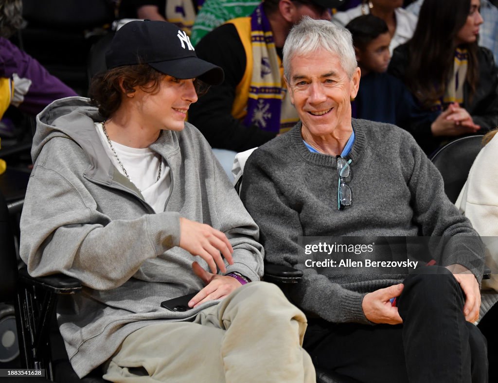Timothee Chalamet and his father Marc Chalamet attend a basketball ... Timothee Chalamet and his father Marc Chalamet attend a basketball ...
