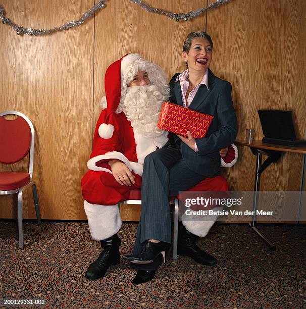Adult On Santas Lap Photos And Premium High Res Pictures Getty Images