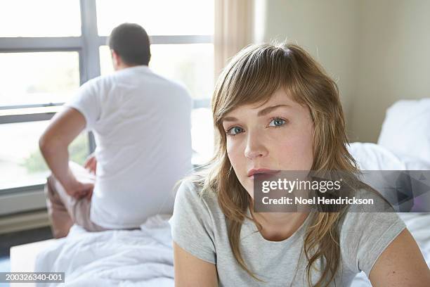 Woman And Man In Bed Facing Camera Sitting Up Photos And Premium High
