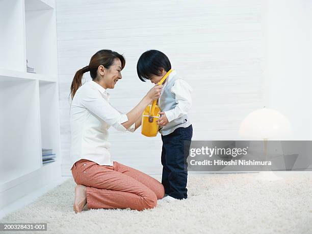 Mom Kneeling Photos And Premium High Res Pictures Getty Images