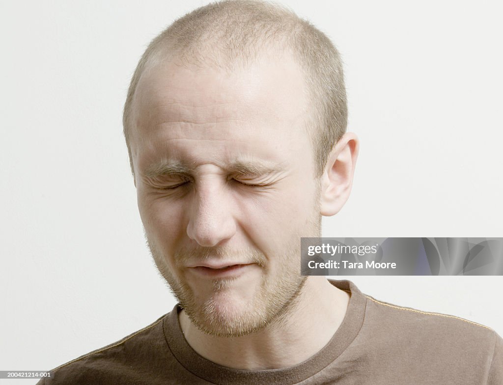 Young Man With Eyes Tightly Closed Closeup High-Res Stock Photo - Getty ... Young Man With Eyes Tightly Closed Closeup High-Res Stock Photo - Getty ...