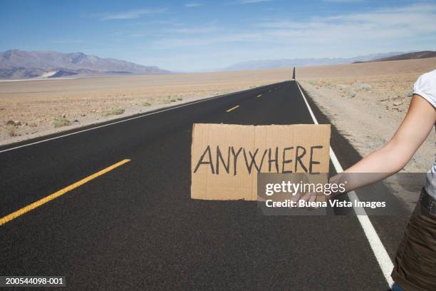 Humorous Hitchhiker In Desert Stock Fotos Und Bilder Getty Images