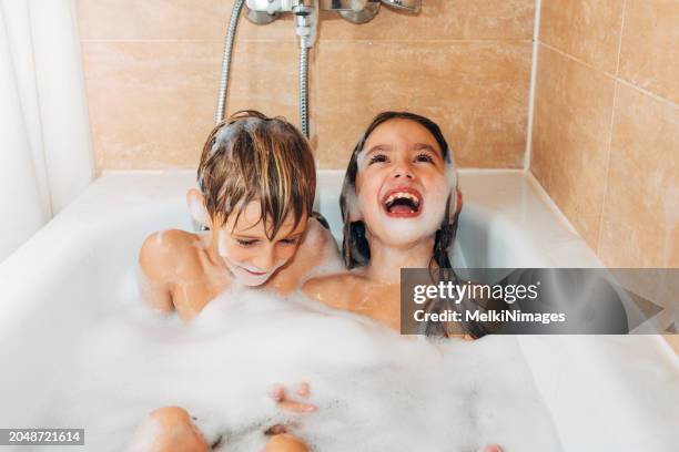 Two Girls Taking Shower Together Photos And Premium High Res Pictures