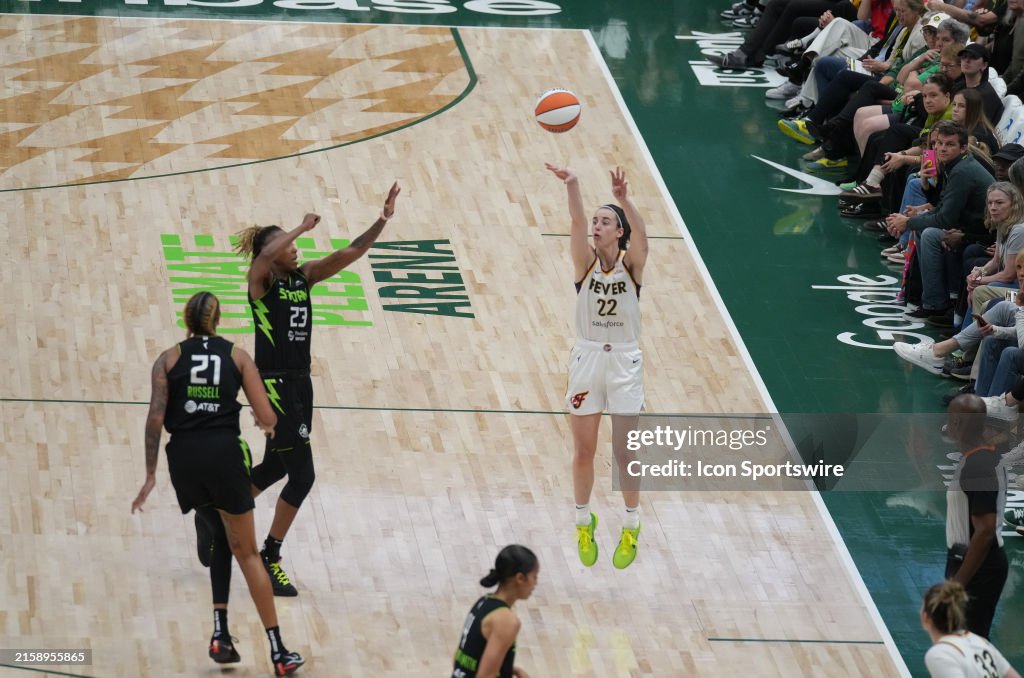 Indiana Fever Guard Caitlin Clark Puts Up A Three Point Shot Against